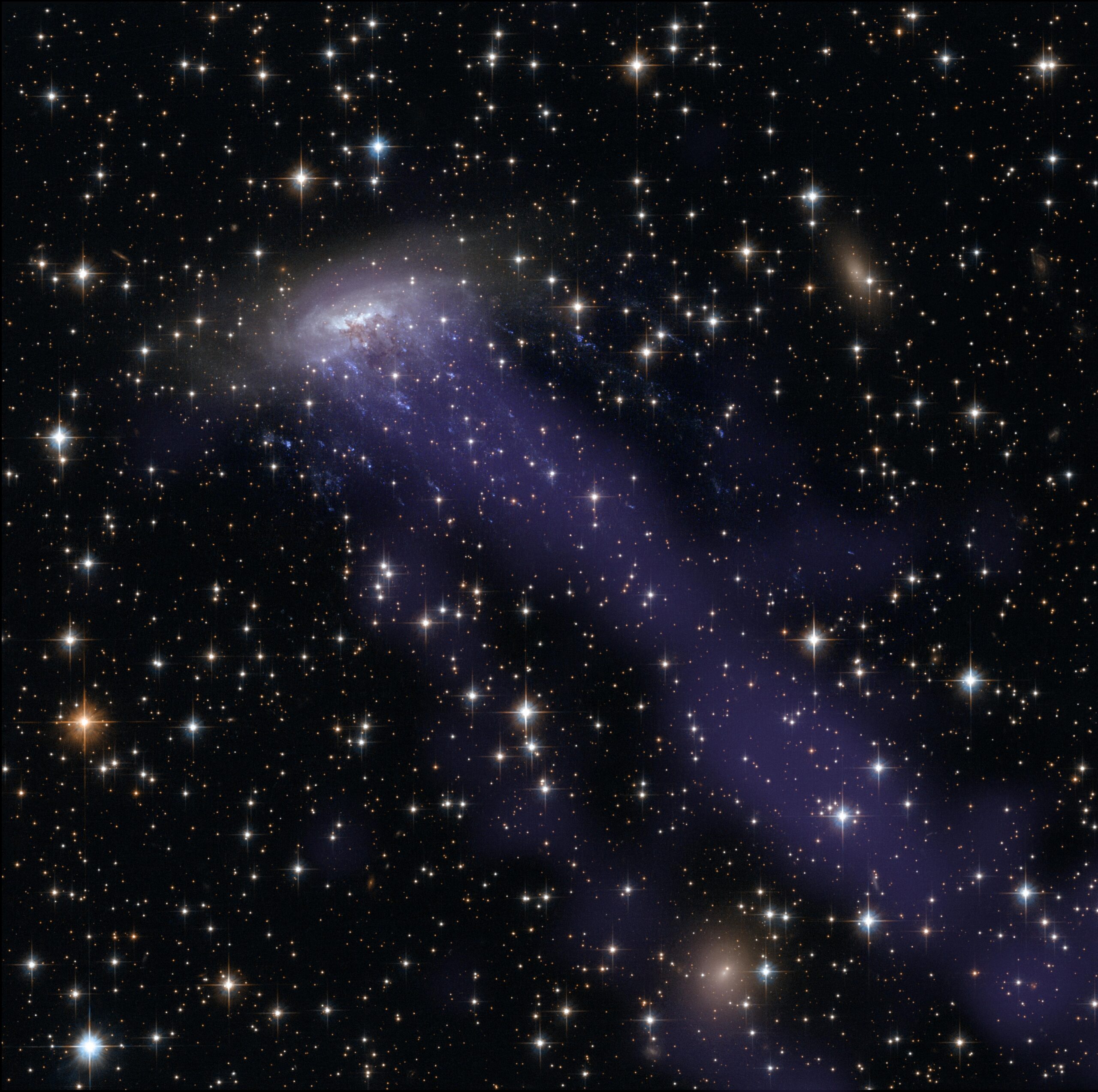 Astronomii au observat o galaxie cu tentacule de pe vremea când ...